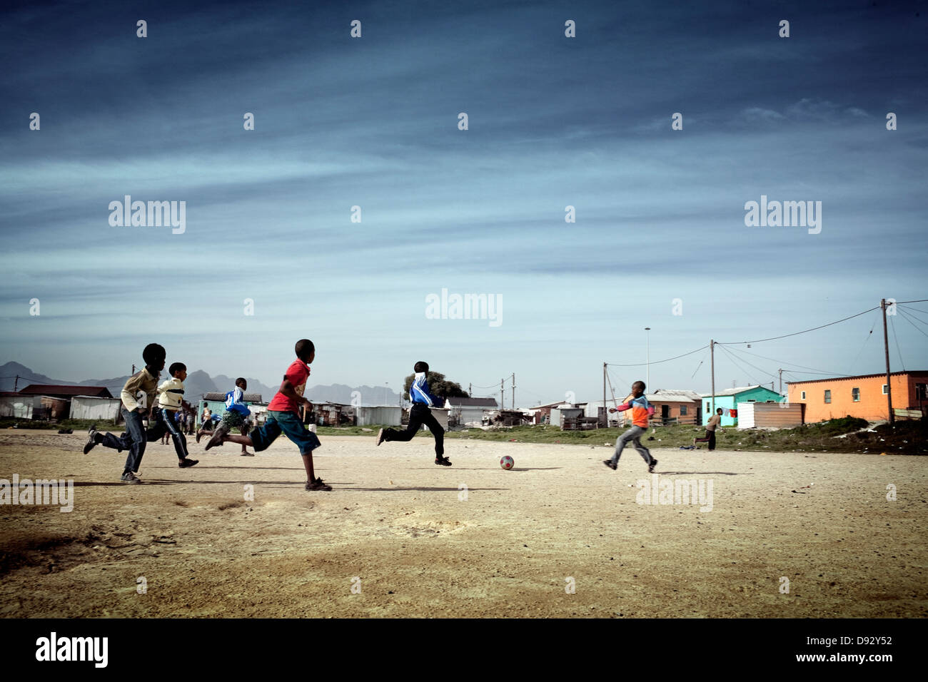 Young african boys playing football They being coached during school ...
