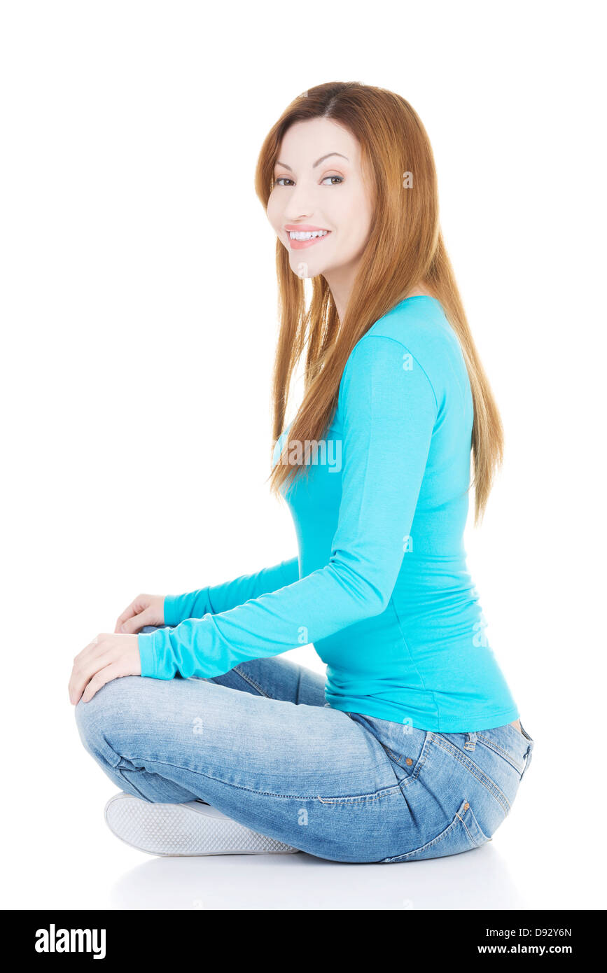 Happy attractive woman sitting, isolated on white Stock Photo - Alamy