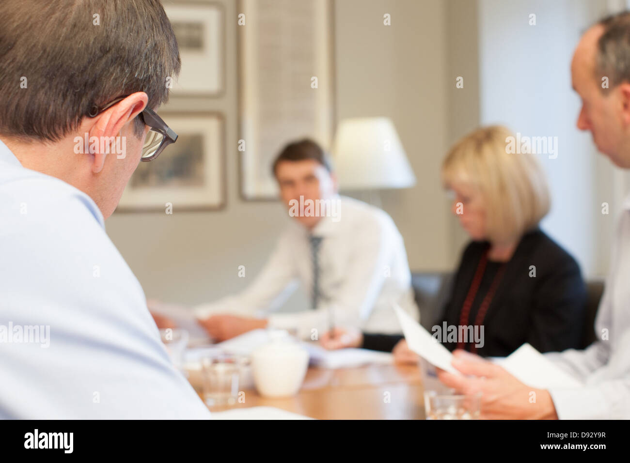 Businessmen meeting in an office of a financial institution Stock Photo ...