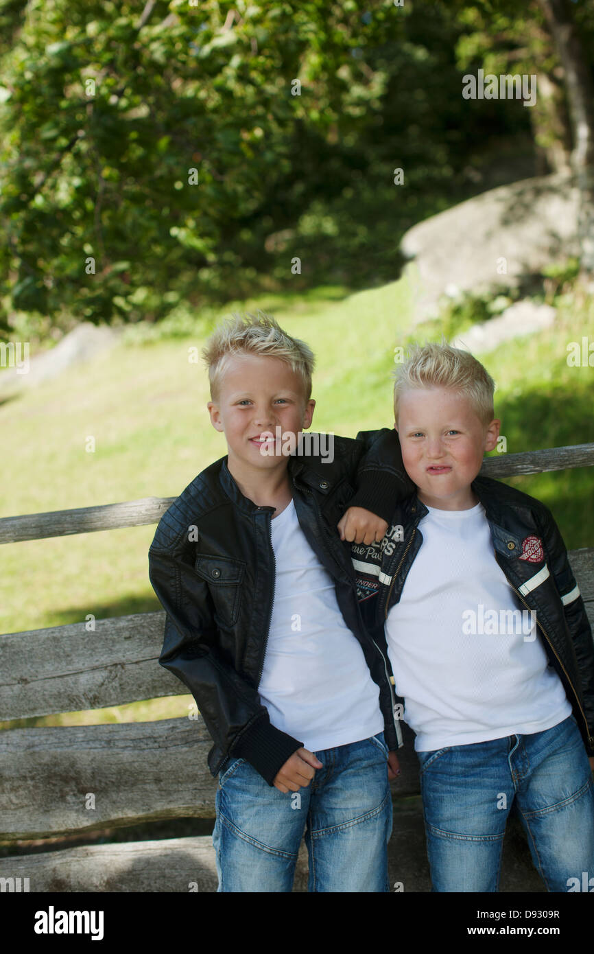 Two boys standing outdoors hi-res stock photography and images - Alamy