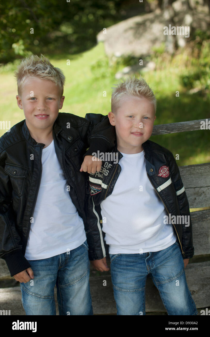 Two boys standing outdoors hi-res stock photography and images - Alamy