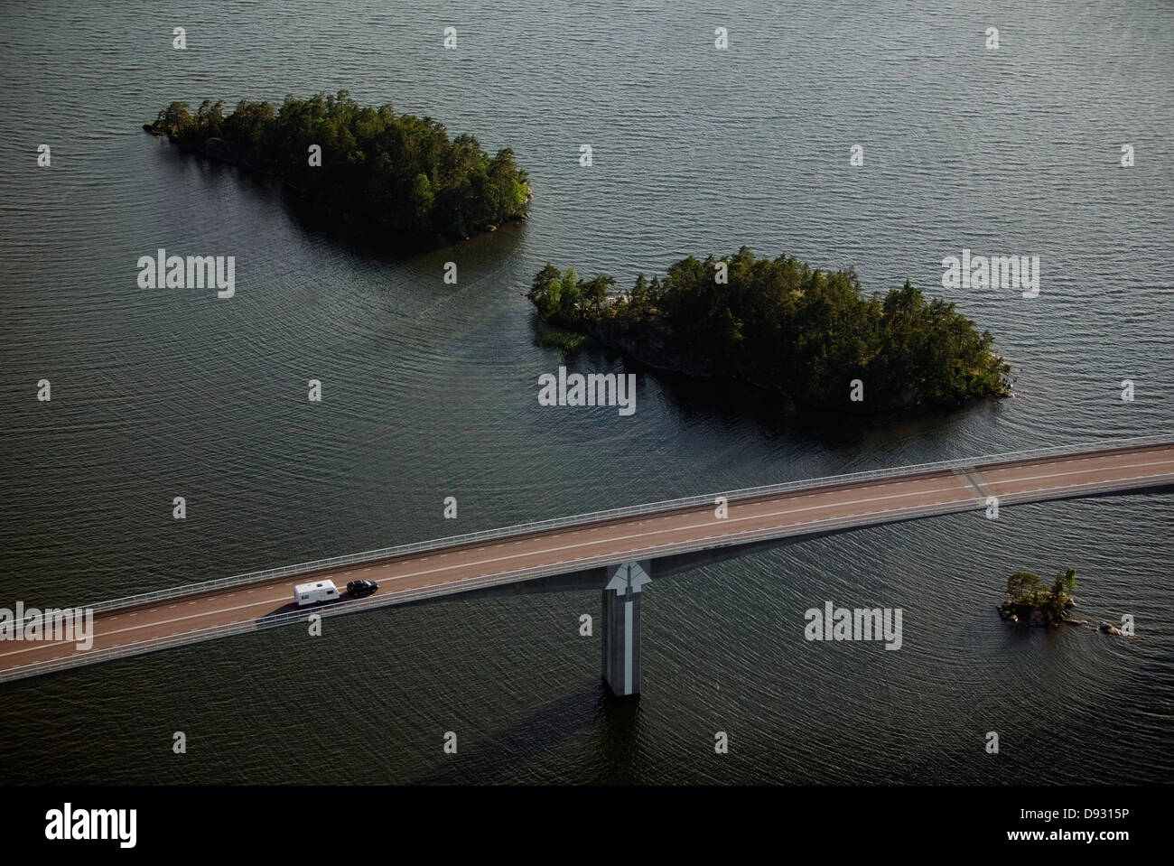 A car and caravan on a bridge, Narke, Sweden Stock Photo - Alamy