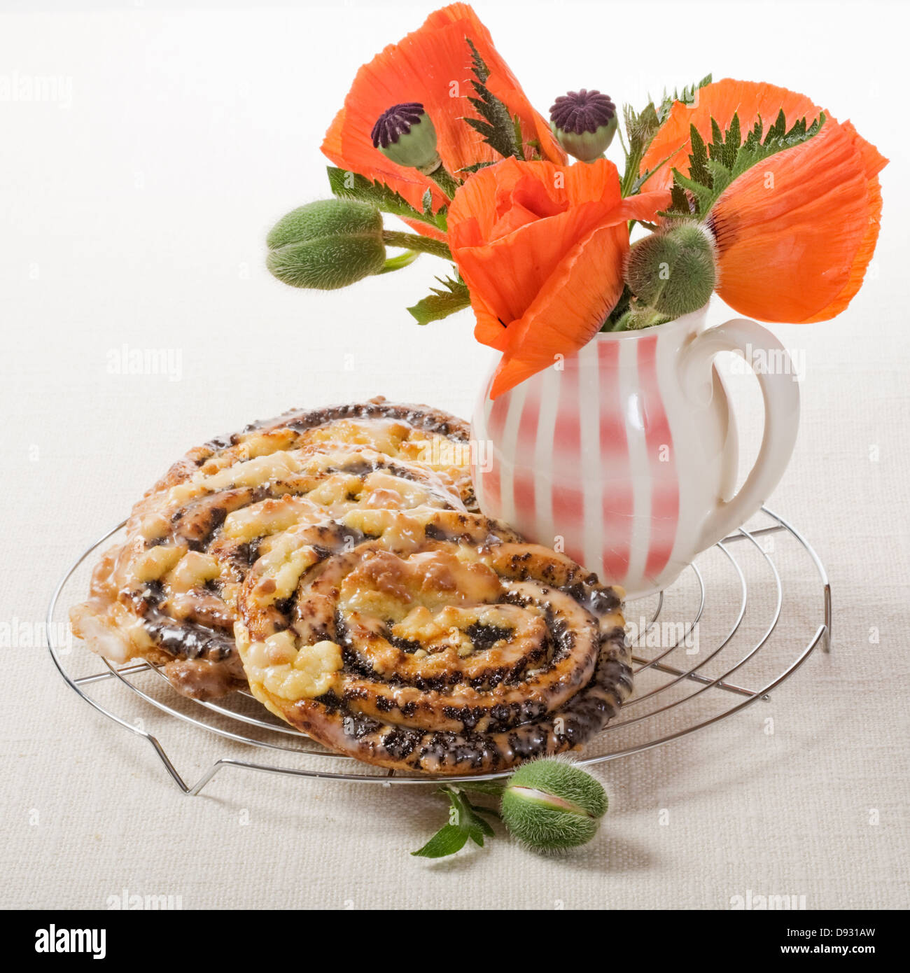 Poppy seed rolls, traditional german Mohnschnecke pastry, on cooling ...