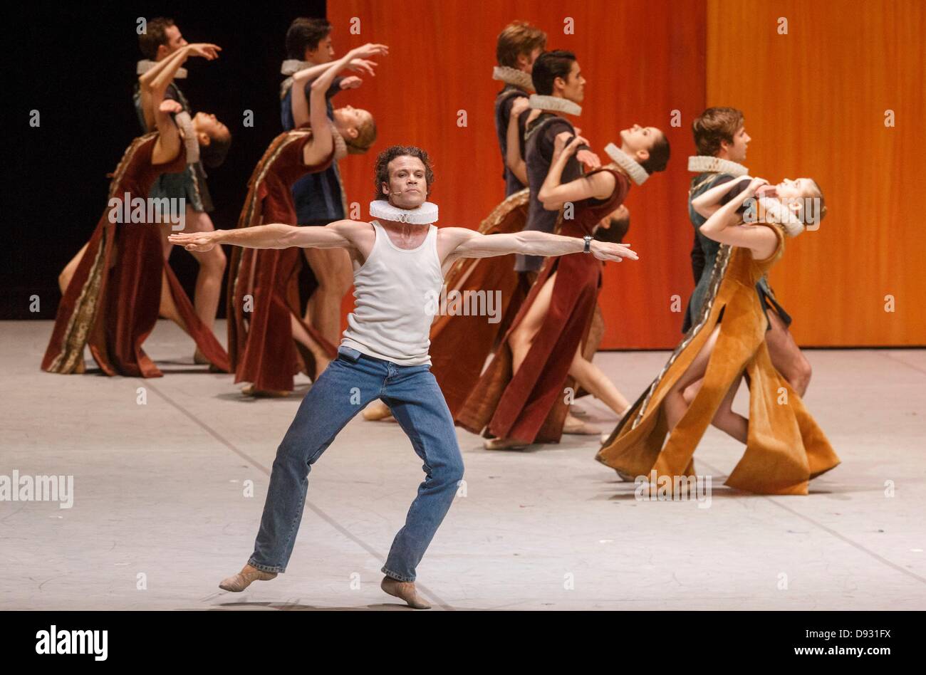 Dancer Carsten Jung (front) and member of the dance ensemble dance on ...