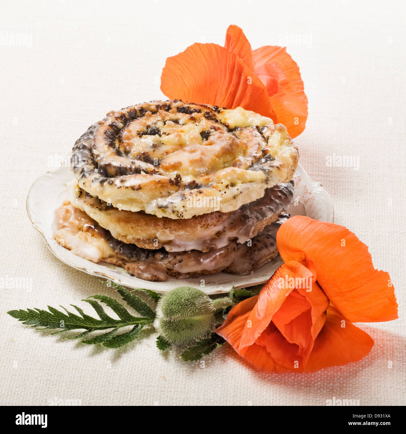 Poppy seed rolls, traditional german Mohnschnecke pastry, on plate with ...