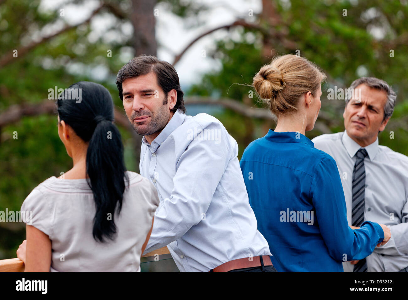 Four people talking not kids not office hi-res stock photography and ...