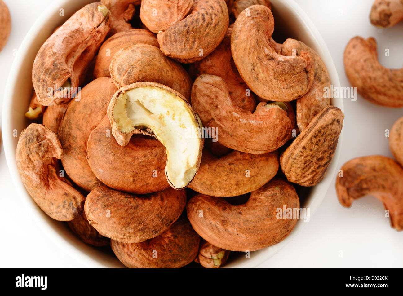 Cashew nuts burned in white bowl Stock Photo - Alamy