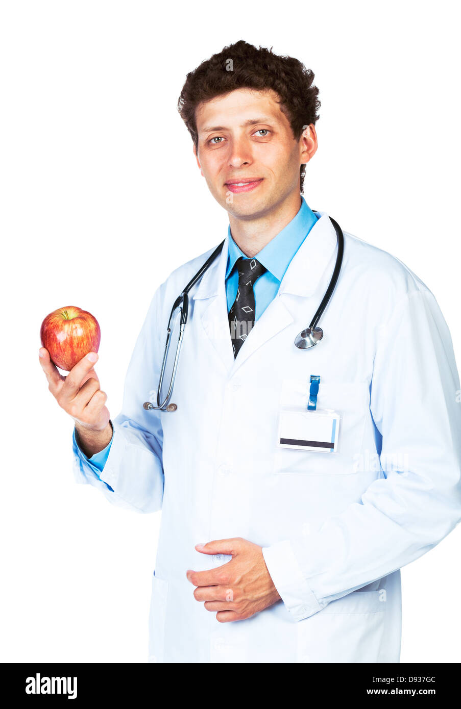Portrait of a smiling male doctor holding red apple on white Stock ...