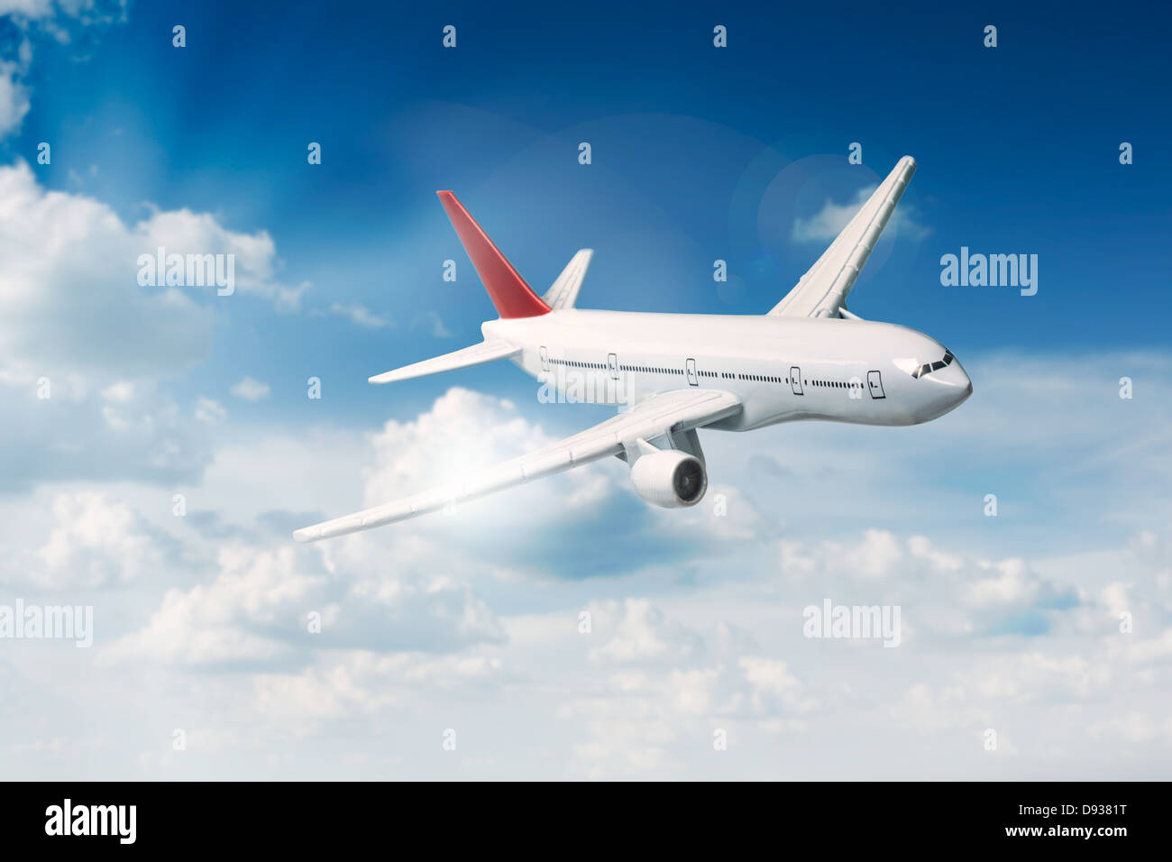 Airplane in the sky Stock Photo - Alamy