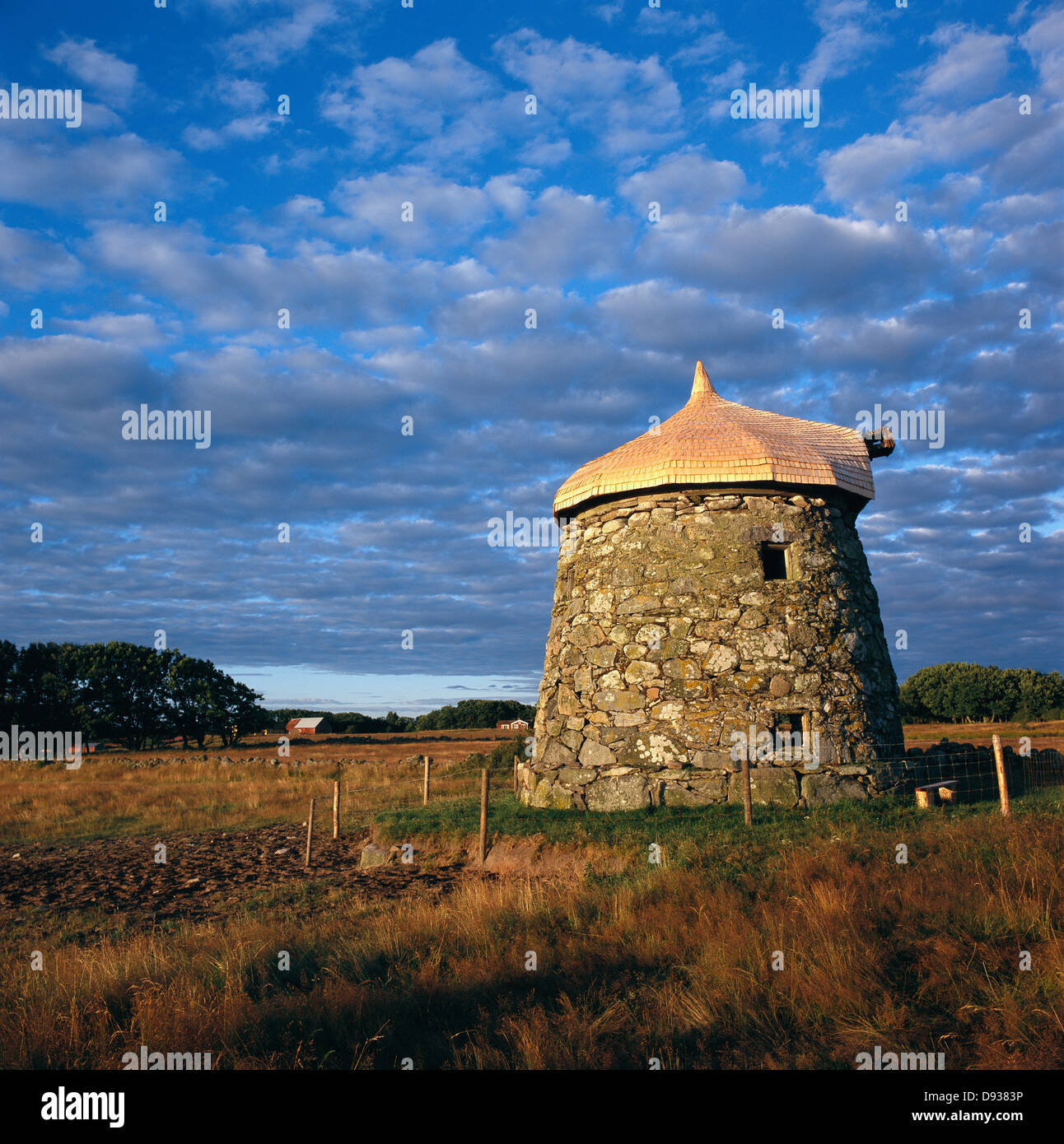 A old mill with fields round Stock Photo - Alamy