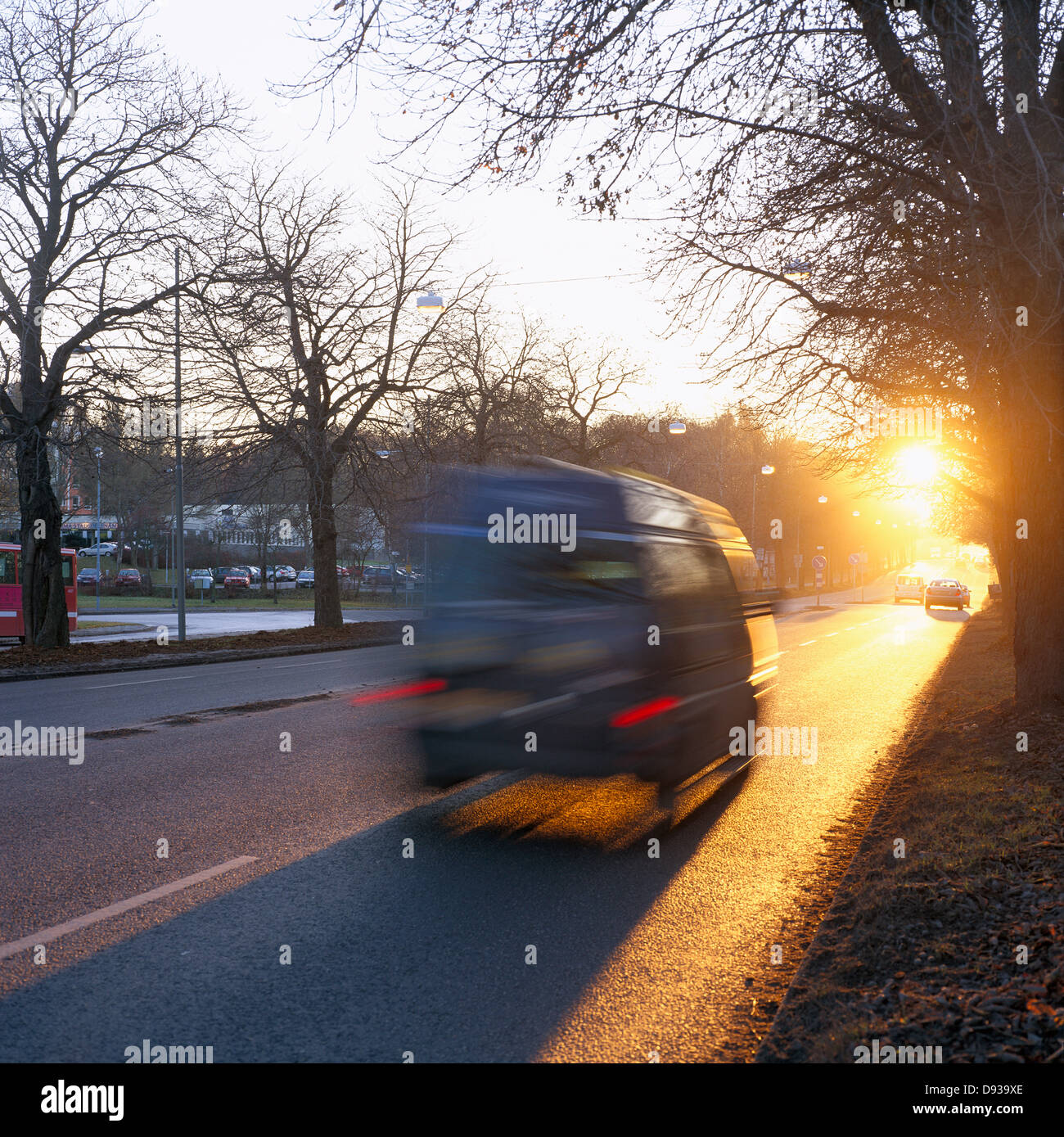 Sunlight on a road Stock Photo - Alamy