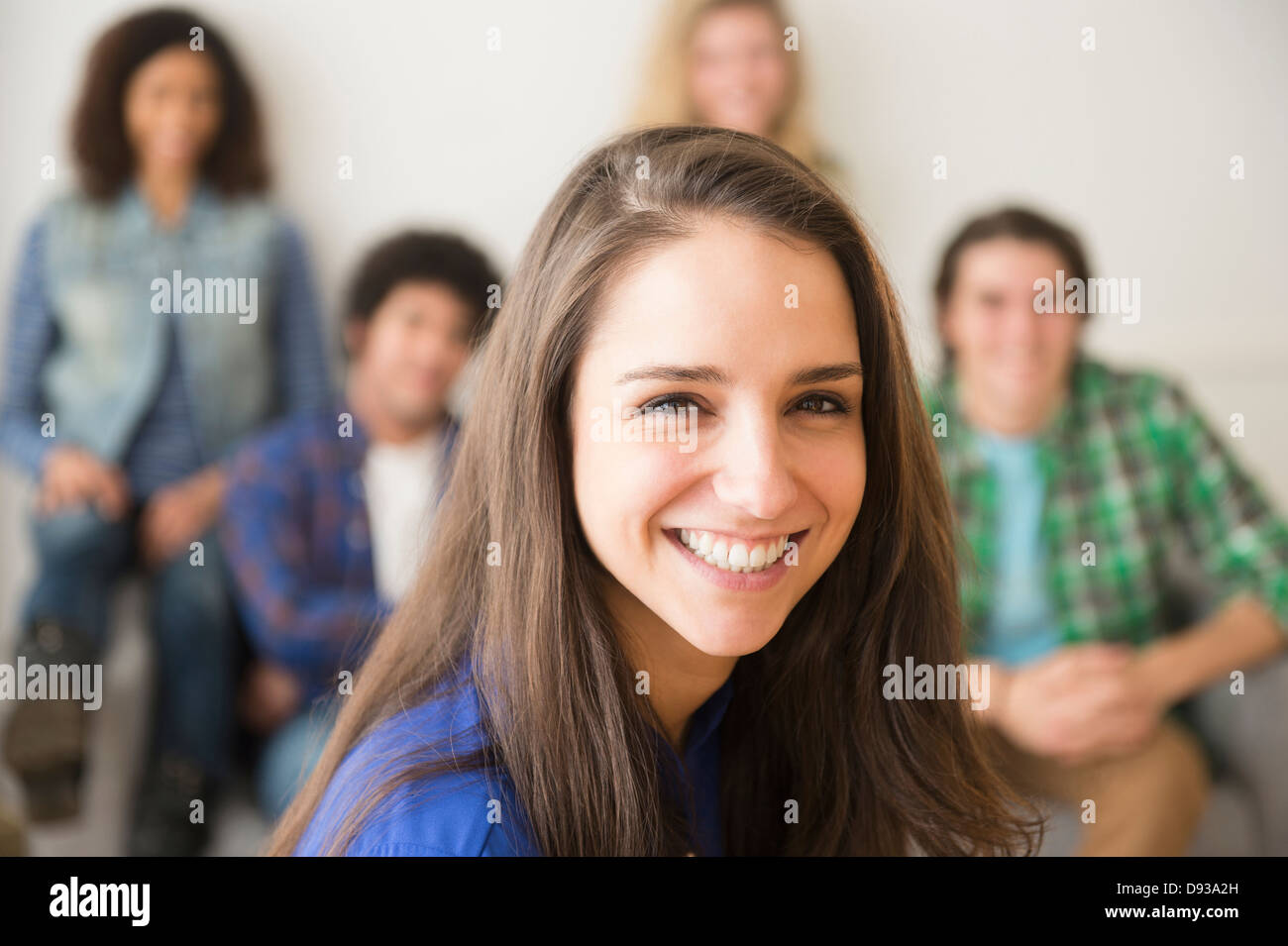 Woman in crowd smiling hi-res stock photography and images - Alamy