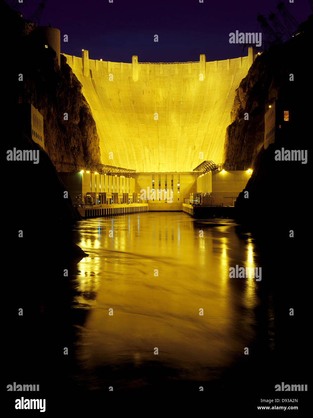 The *Hoover Dam* at night, captured in a stunning photograph, showcases ...