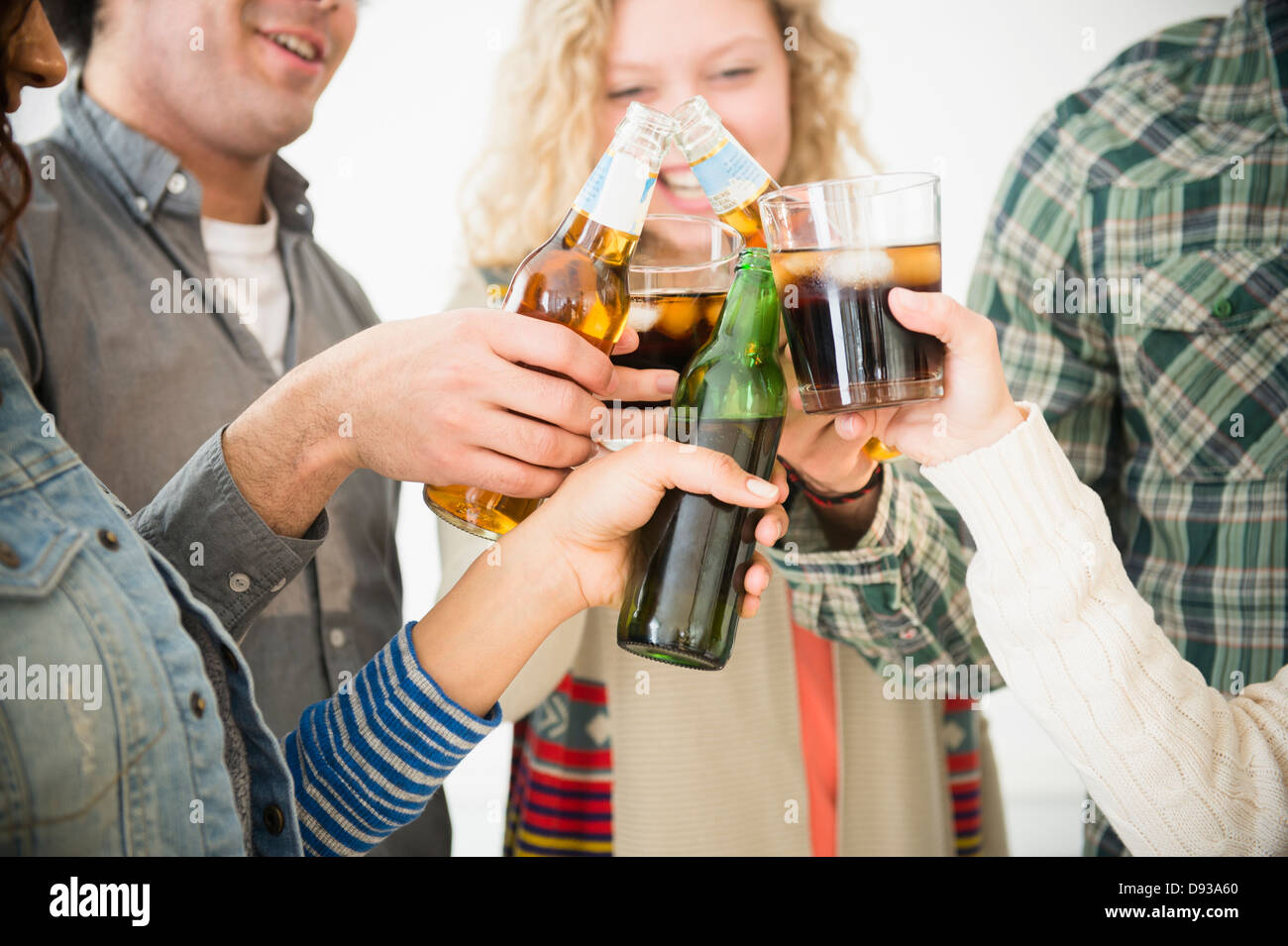 Friends toasting each other at party Stock Photo - Alamy