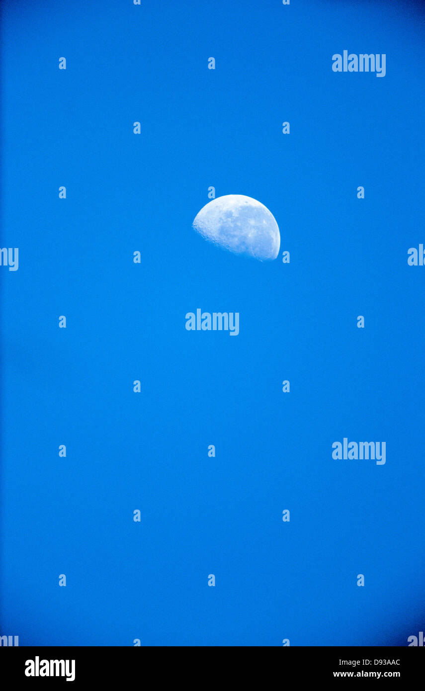 Half-moon on a blue sky Stock Photo - Alamy
