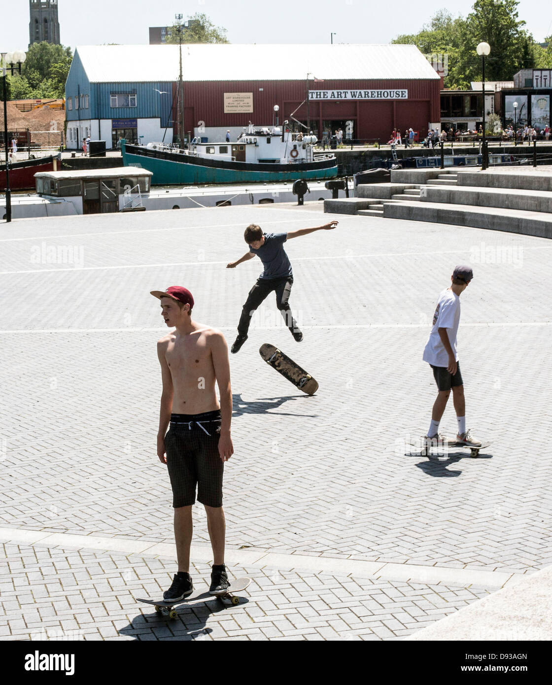 Kids skateboarding on waterfront Bristol Stock Photo - Alamy
