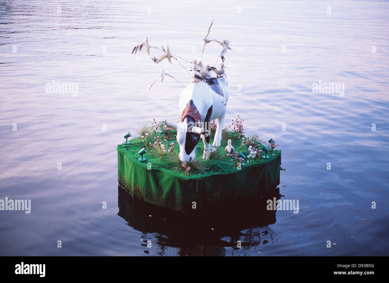Replica of birds and cow in water Stock Photo - Alamy