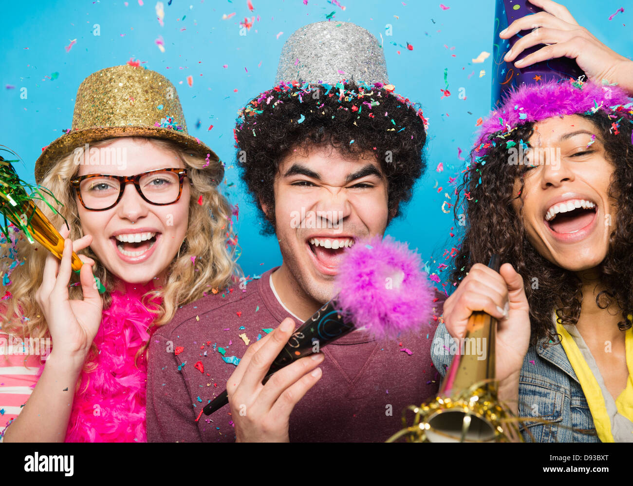Friends wearing hats at party Stock Photo - Alamy