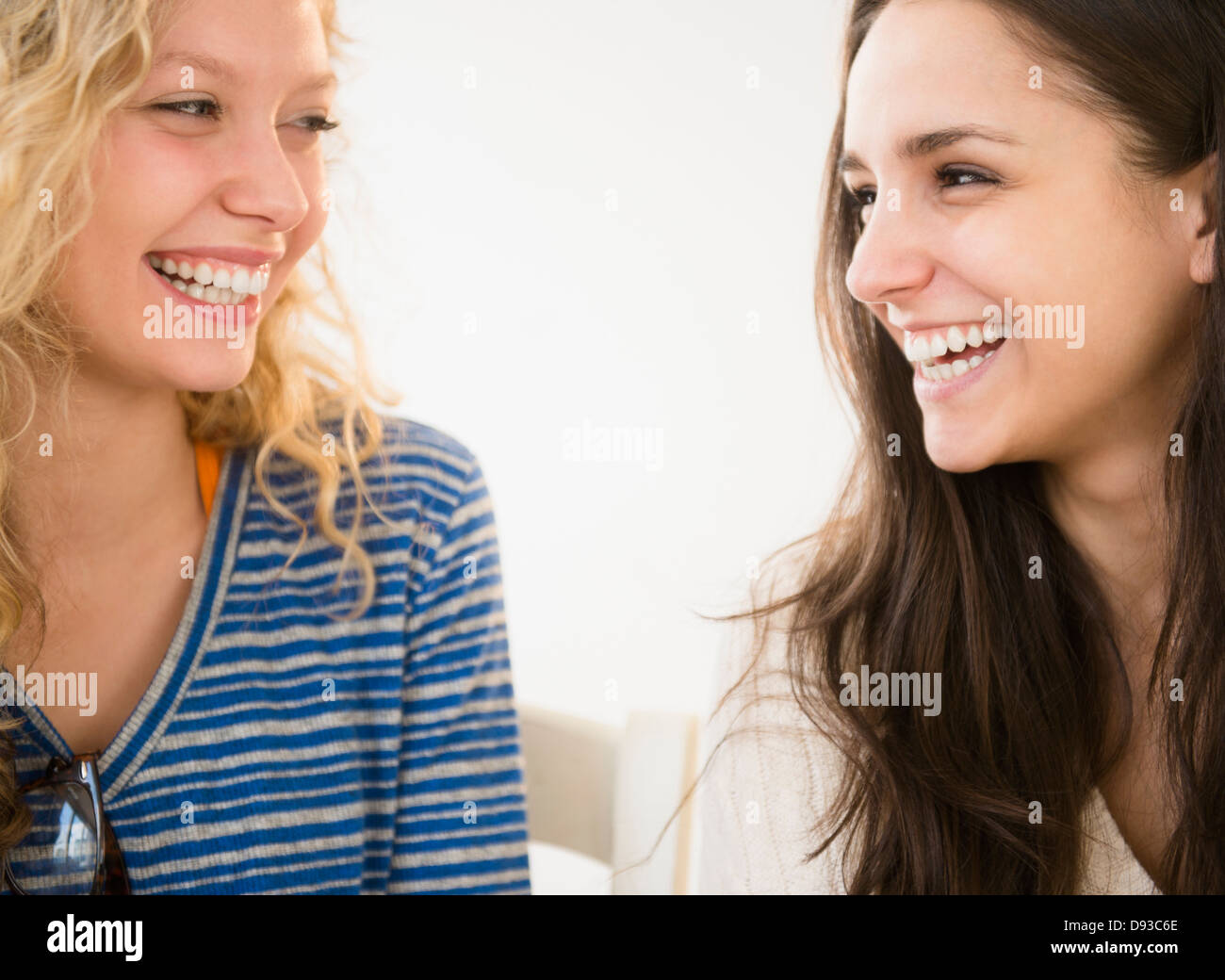 Women laughing together Stock Photo - Alamy