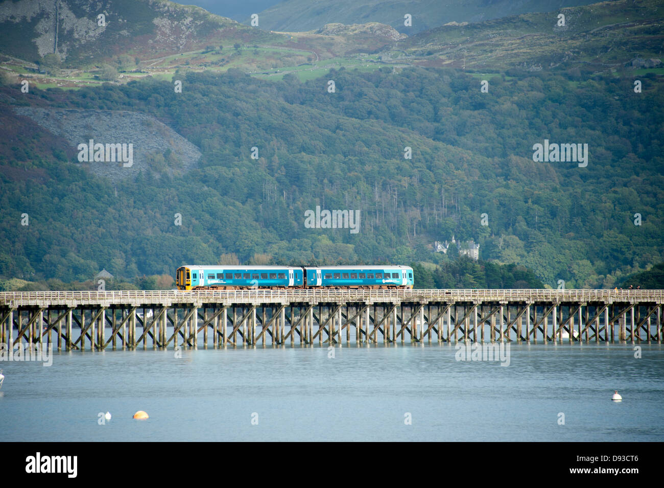 Train on bridge over water Wales UK Stock Photo - Alamy