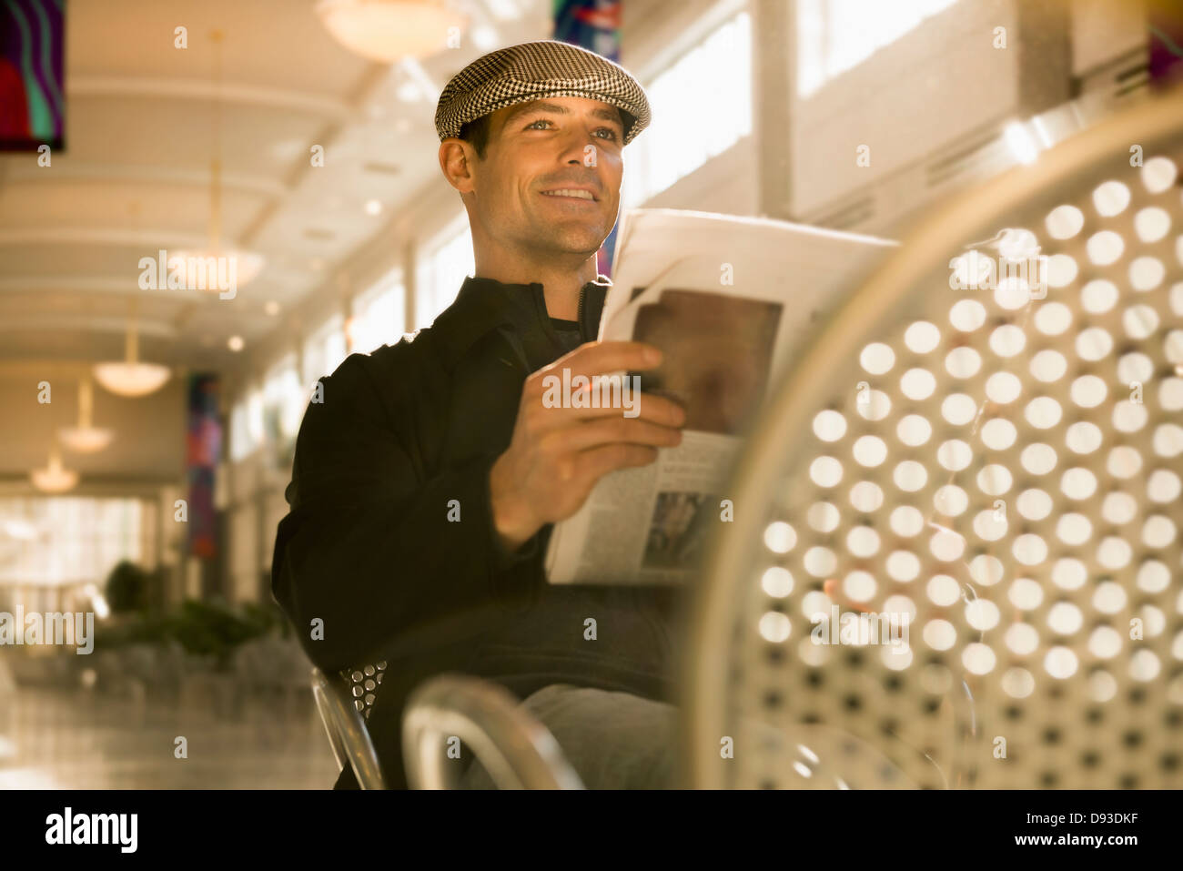 Boy reading newspaper hi-res stock photography and images - Alamy