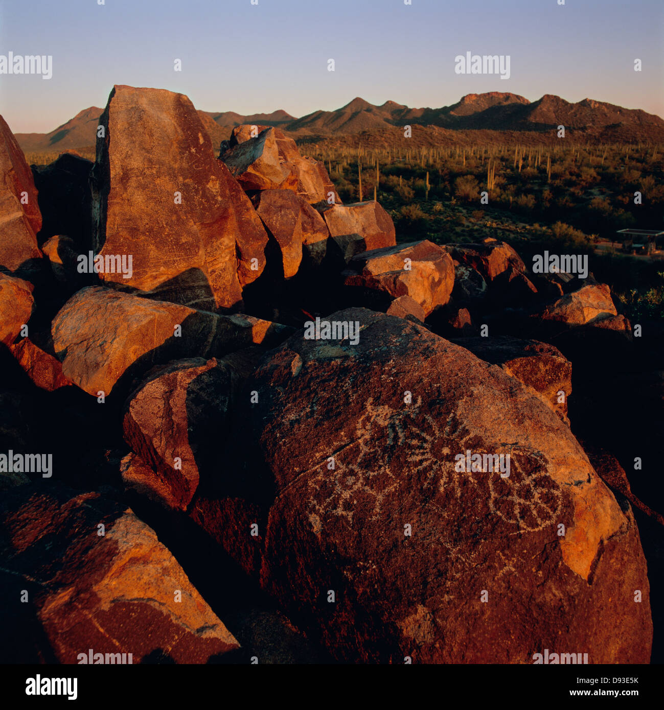 Rocks with mountains in background Stock Photo - Alamy