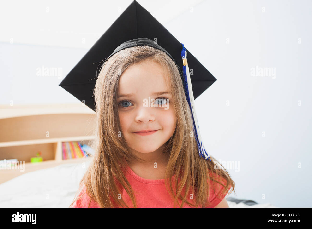 Caucasian girl wearing graduate cap Stock Photo - Alamy