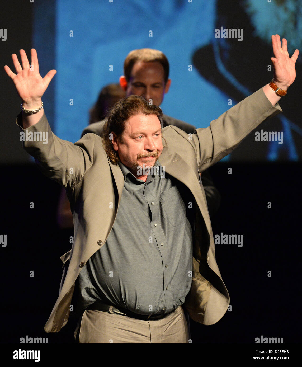 German actor Armin Rohde cheers as he receives the acting award at the ...