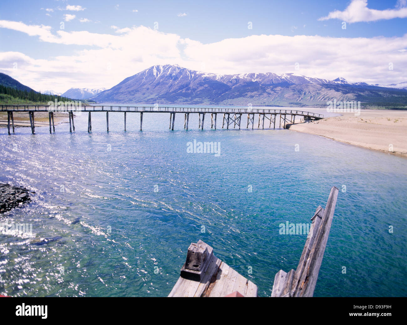 Bridge across river with mountain background Stock Photo - Alamy