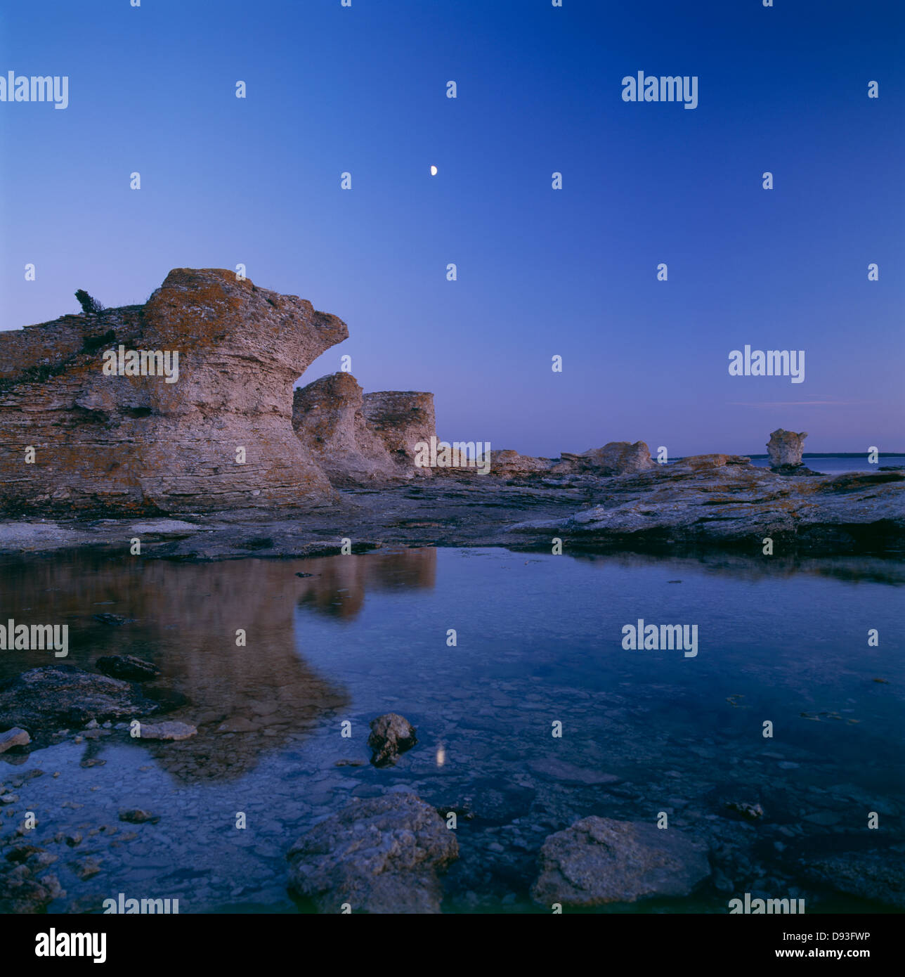 View of limestone pinnacle against blue Stock Photo - Alamy