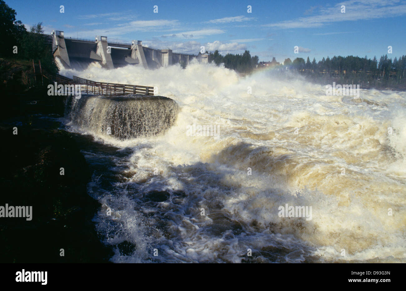 Water flowing through dam Stock Photo - Alamy
