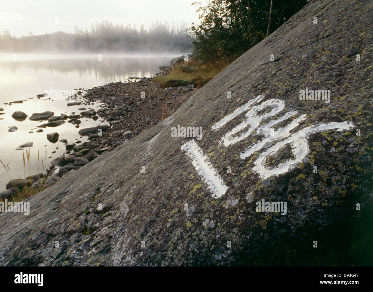 Rock with number on it Stock Photo - Alamy