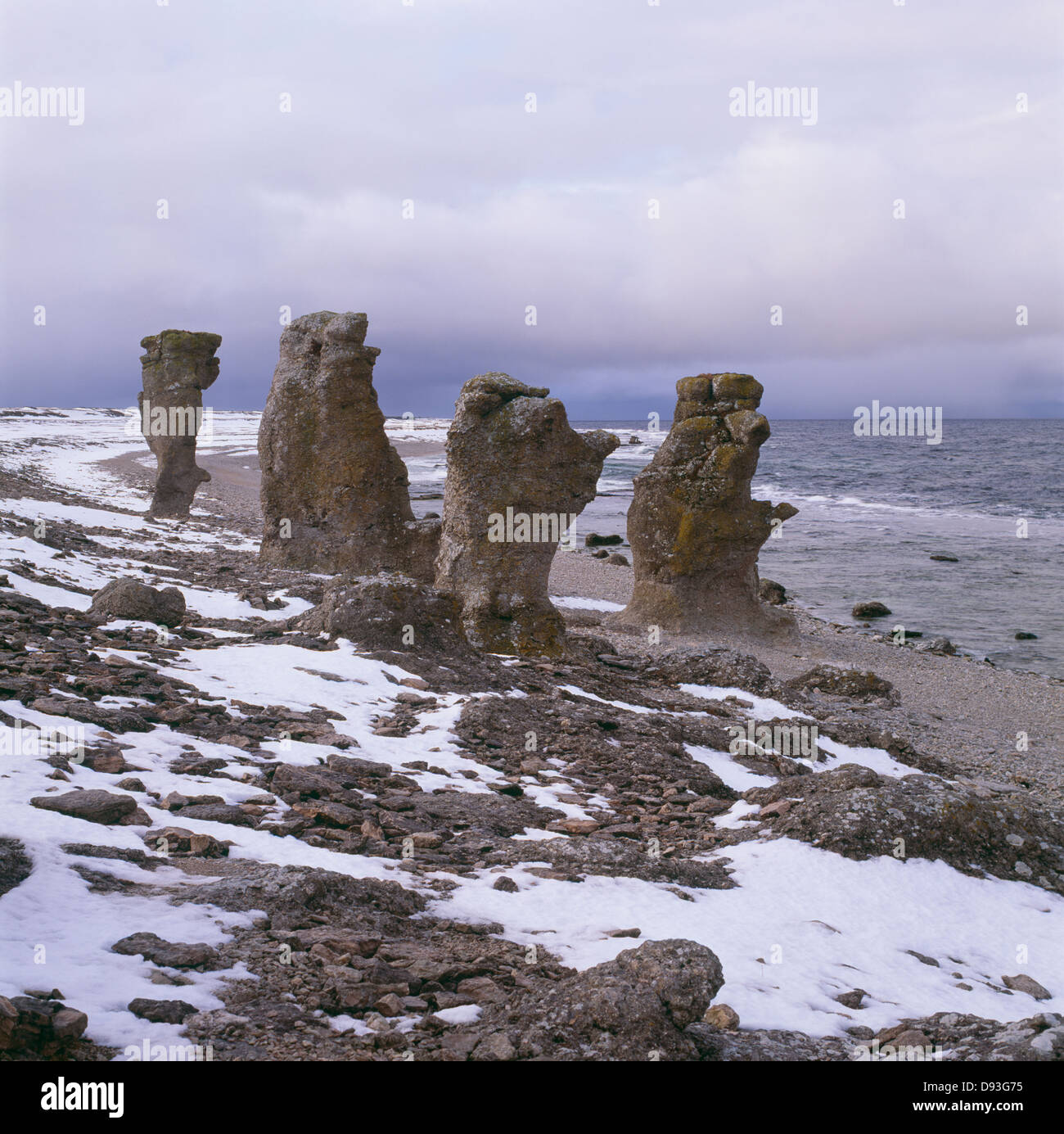 View of limestone pillars on beach Stock Photo - Alamy