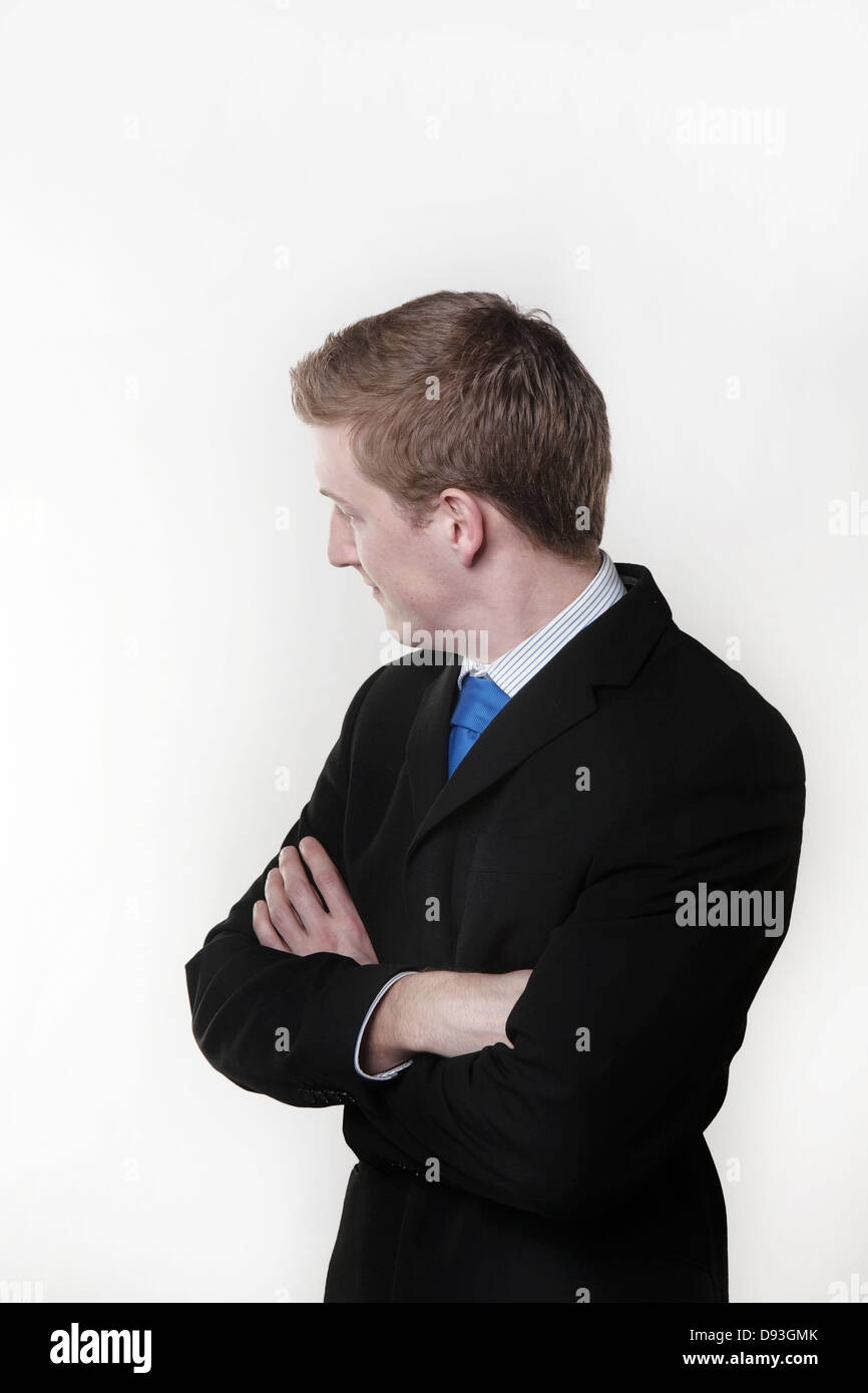 business man standing looking around Stock Photo - Alamy