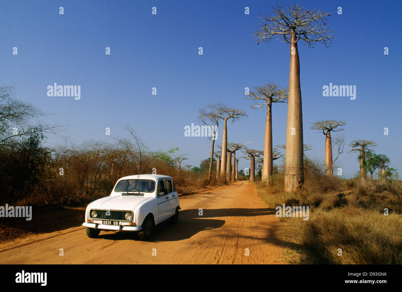 Taxi moving on country road Stock Photo - Alamy