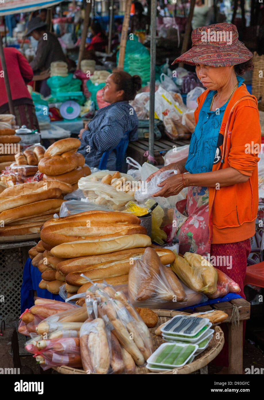 Woman Selling French Baguettes Bread, Pakse, Laos Stock Photo - Alamy