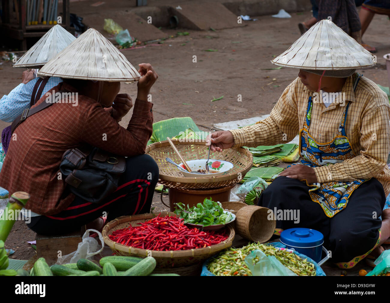 Women Selling Food On A Market, Pakse, Laos Stock Photo - Alamy