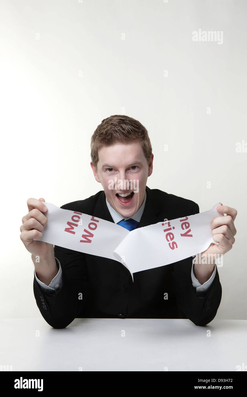 Man ripping up paper hi-res stock photography and images - Alamy