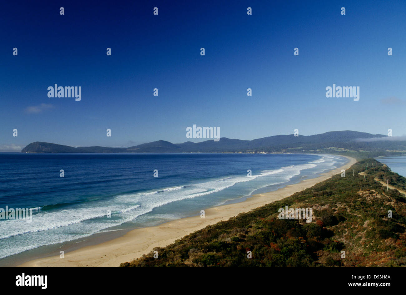 Beach with mountains in the background hi-res stock photography and ...