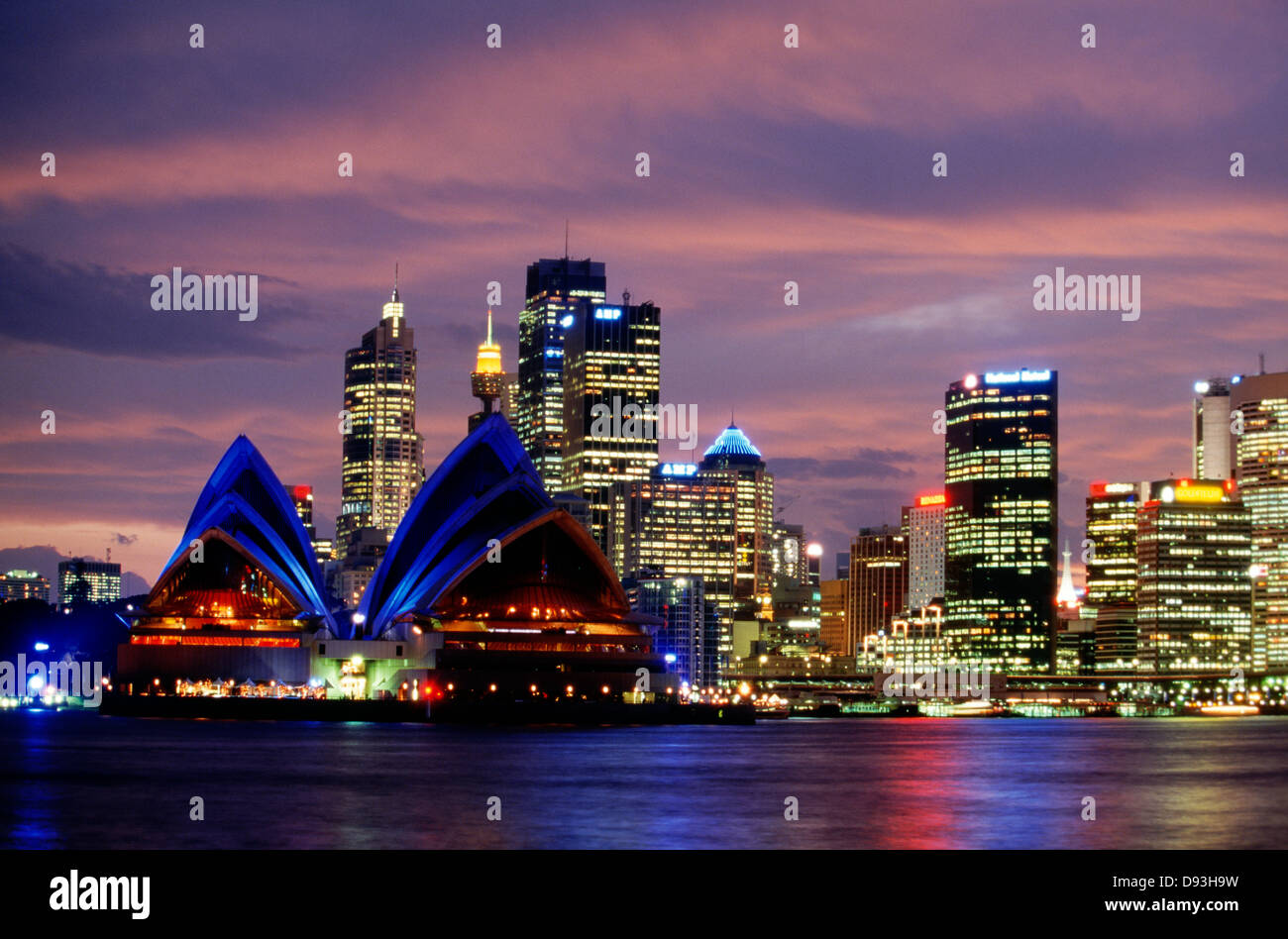Sydney Opera House and skyline at night Stock Photo - Alamy