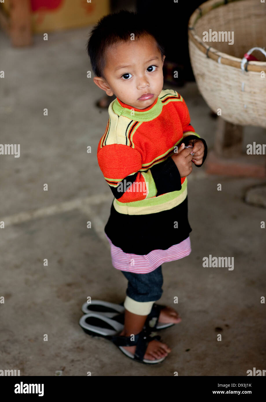 Khmu Minority Girl With Big Shoes, Xieng Khouang, Laos Stock Photo - Alamy