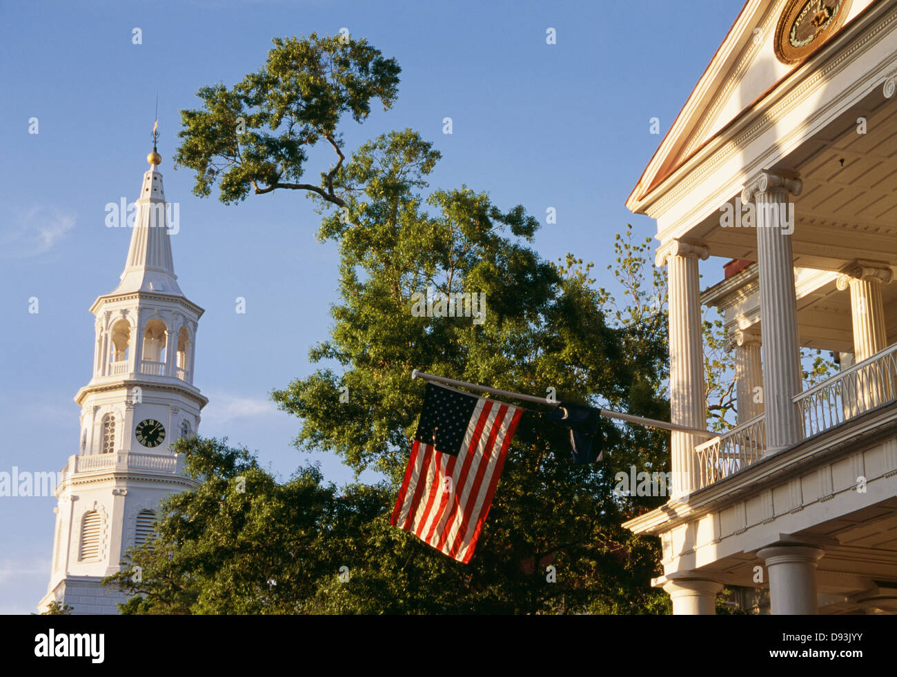 View of American flag with church Stock Photo - Alamy