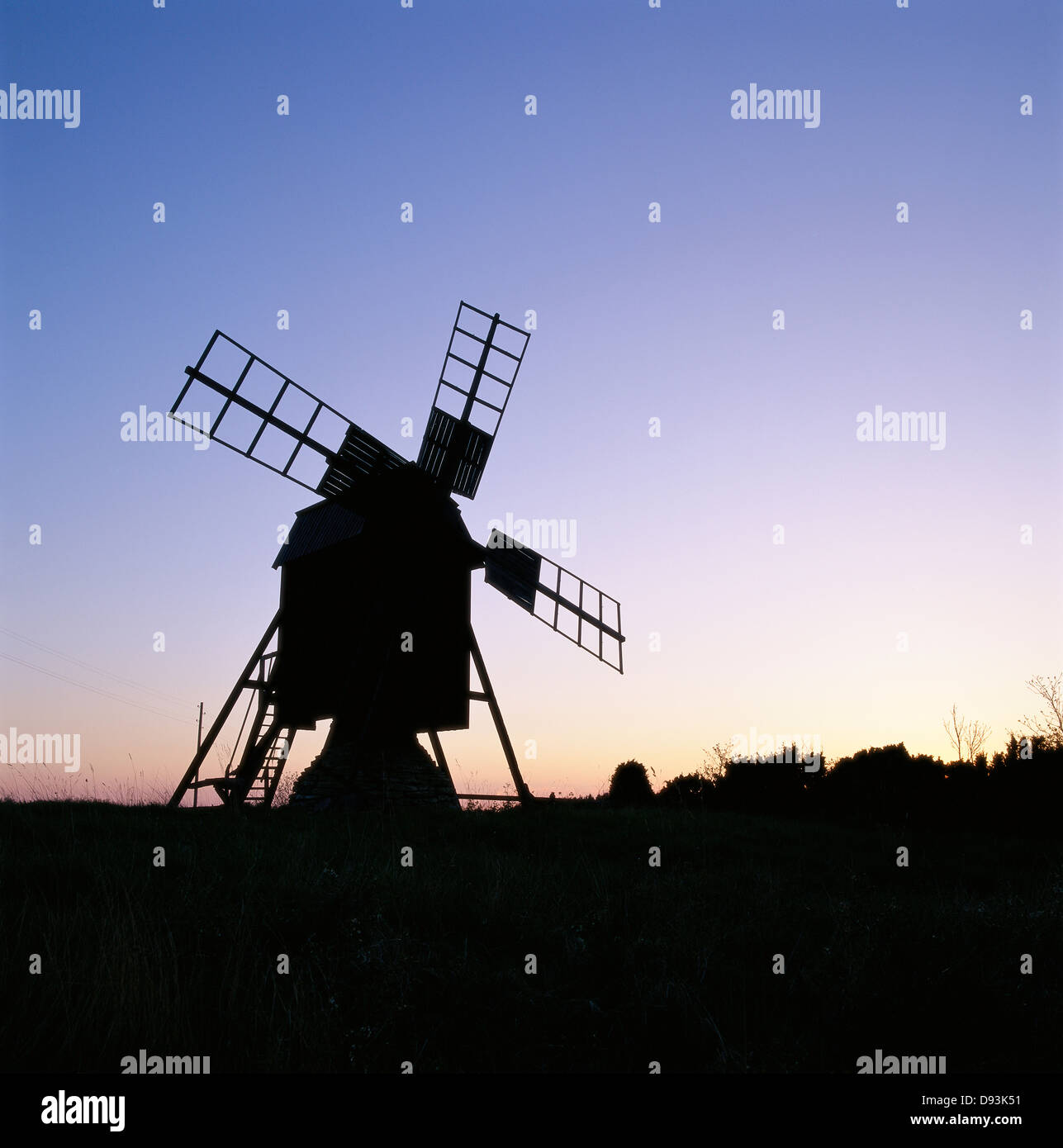 Silhouette of weather mill Stock Photo - Alamy