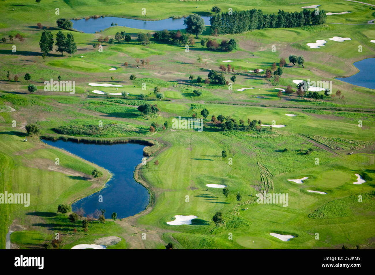 Golf course with ponds Stock Photo - Alamy