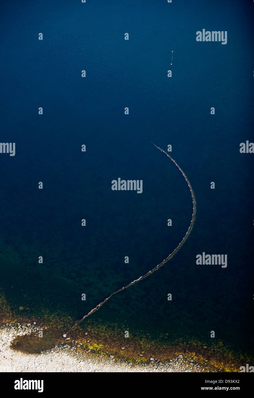 Fishing-net in the ocean Stock Photo - Alamy