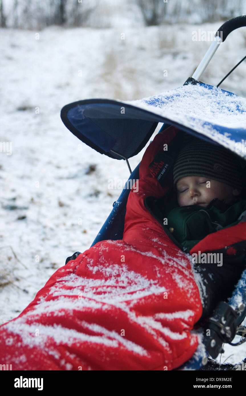 A child sleeping in a stroller, Sweden Stock Photo - Alamy