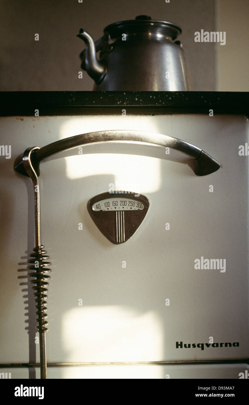 Teapot on kitchen range, close-up Stock Photo - Alamy