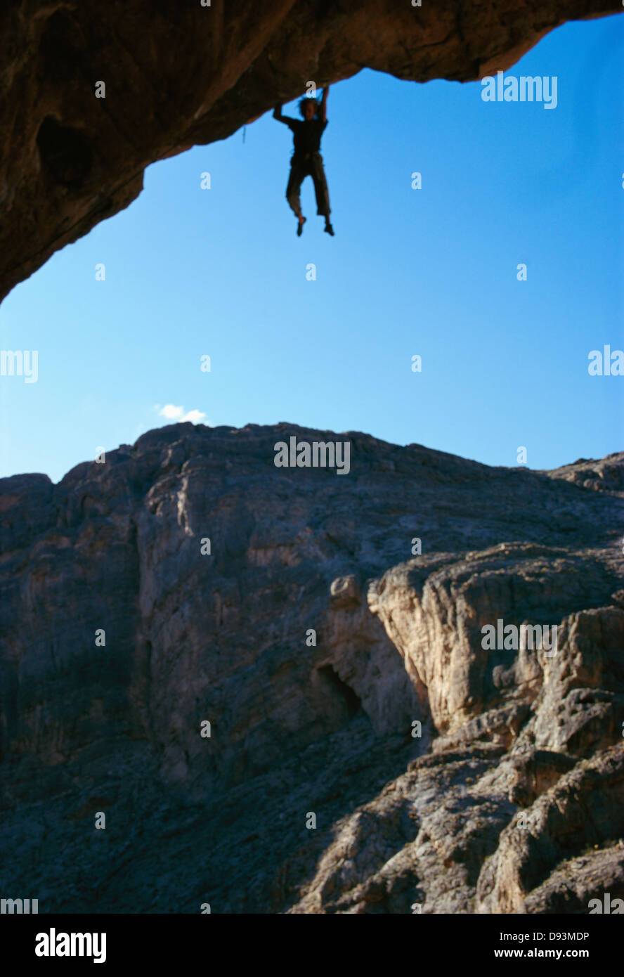 Man hanging from cliff hi-res stock photography and images - Alamy