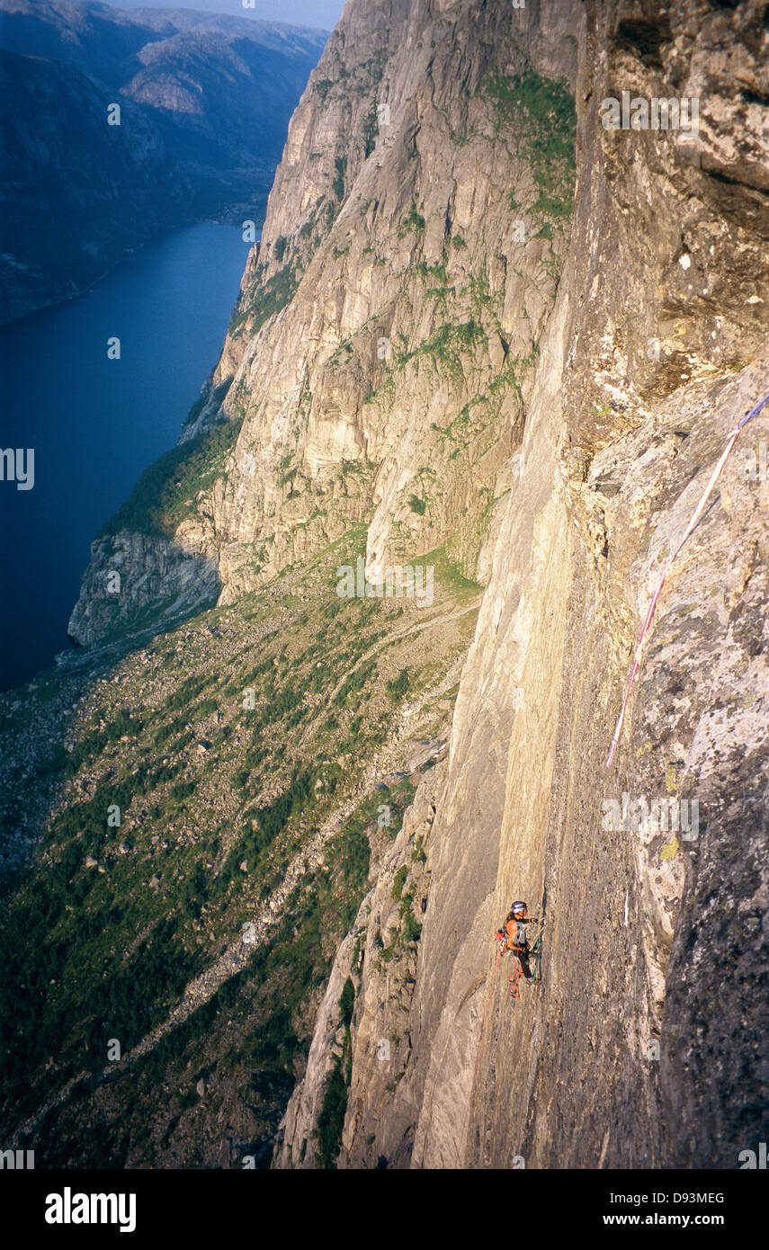 Person climbing mountain, elevated view Stock Photo - Alamy