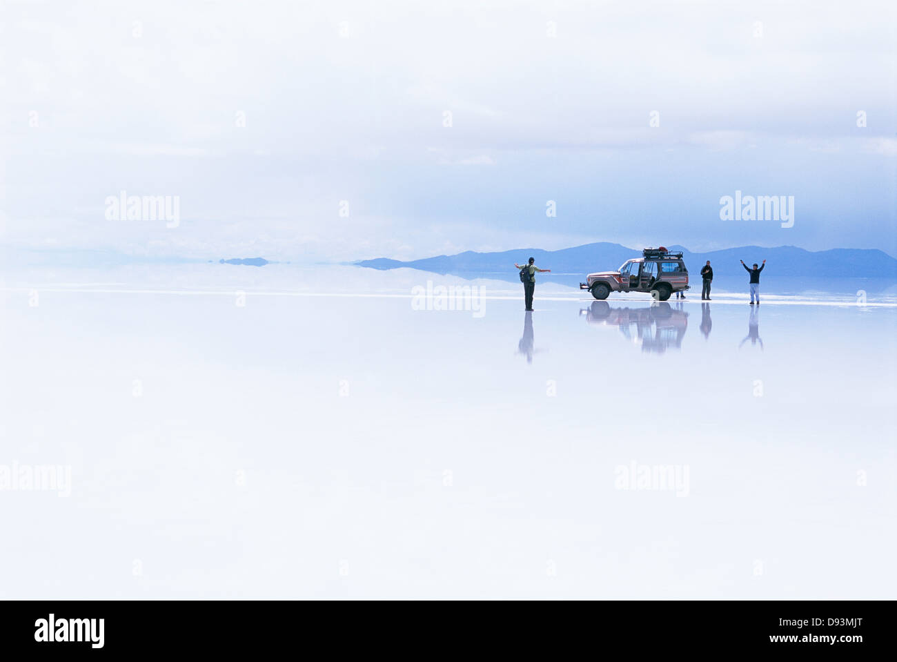 People in a salt desert Stock Photo - Alamy